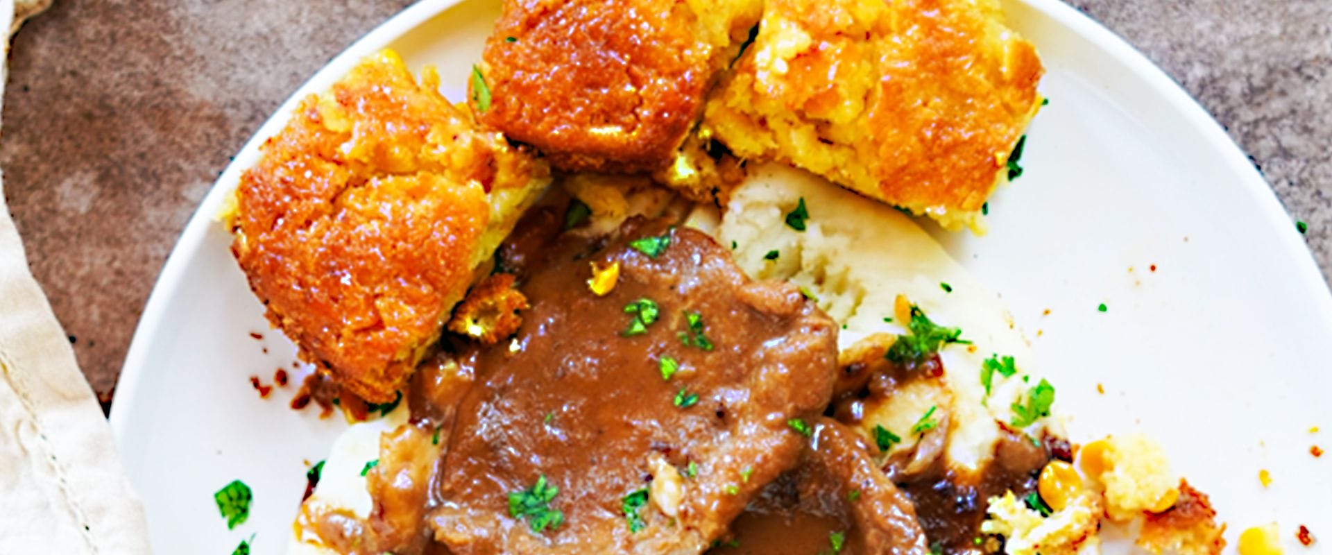 Country Style Pork Chops with Cornbread Pudding - Soulful Pork